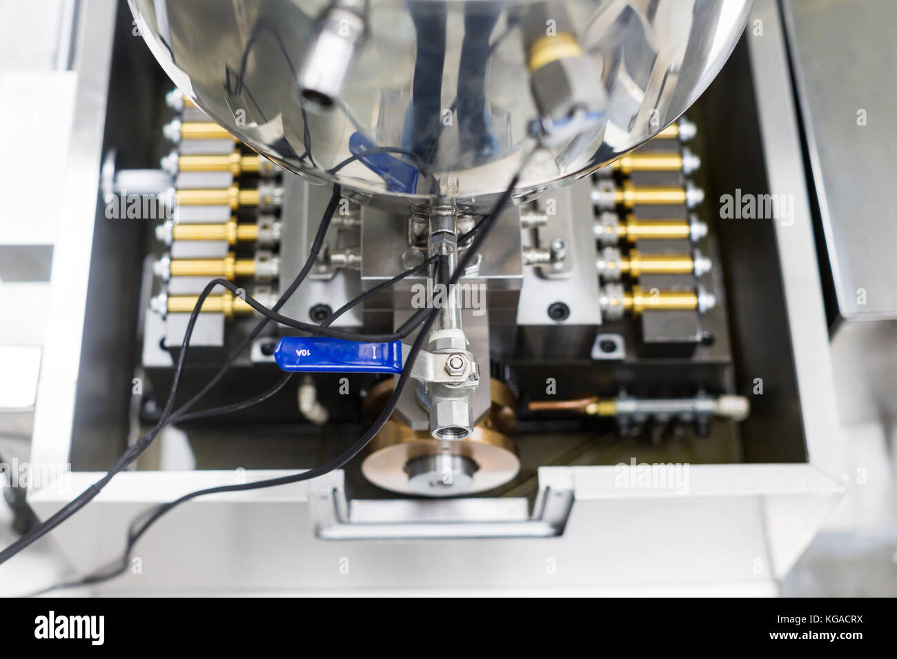 engine of machine with bolts and coils Stock Photo - Alamy