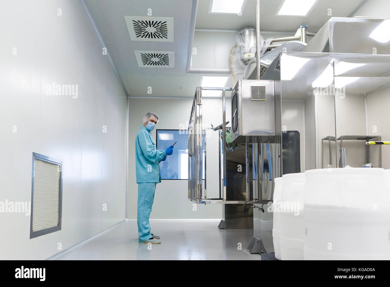 scientist stand near control panel Stock Photo - Alamy