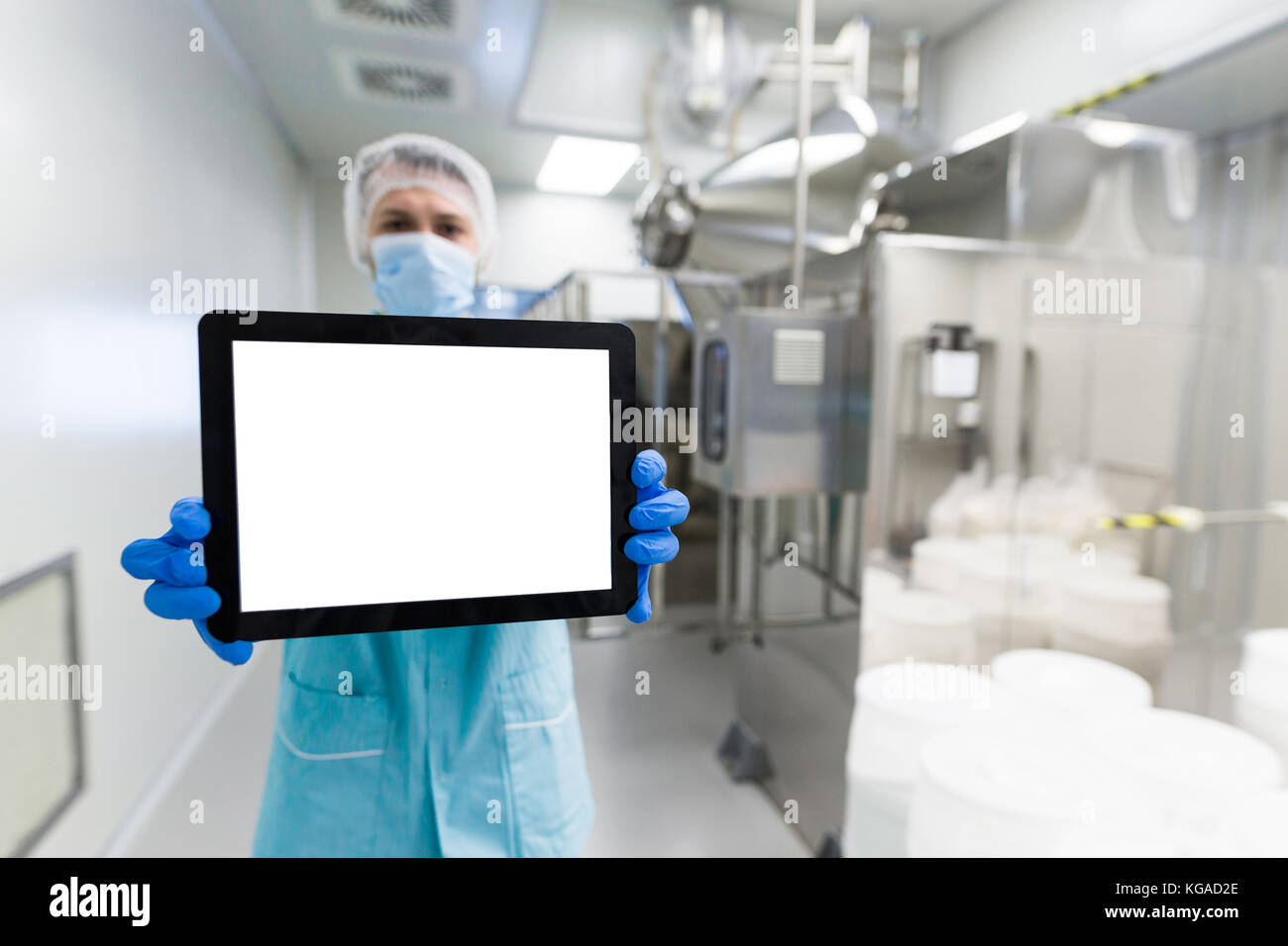 medical worker is showing the empty tablet, blured background Stock ...