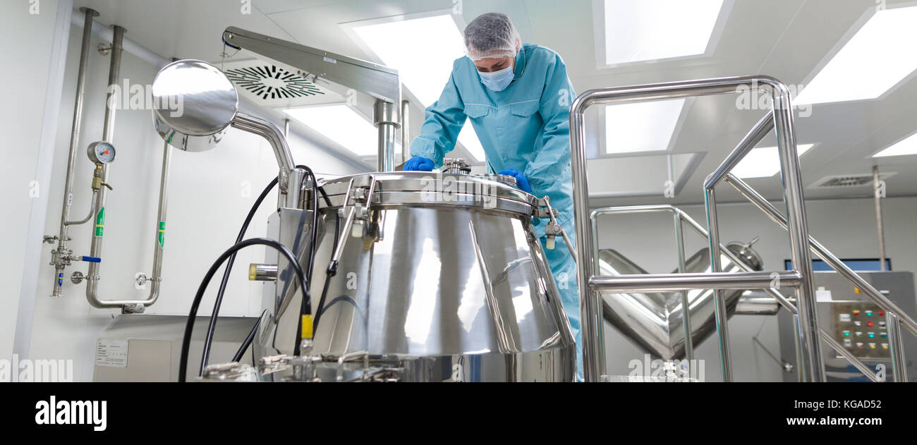 scientist look in steel tank in laboratory Stock Photo - Alamy