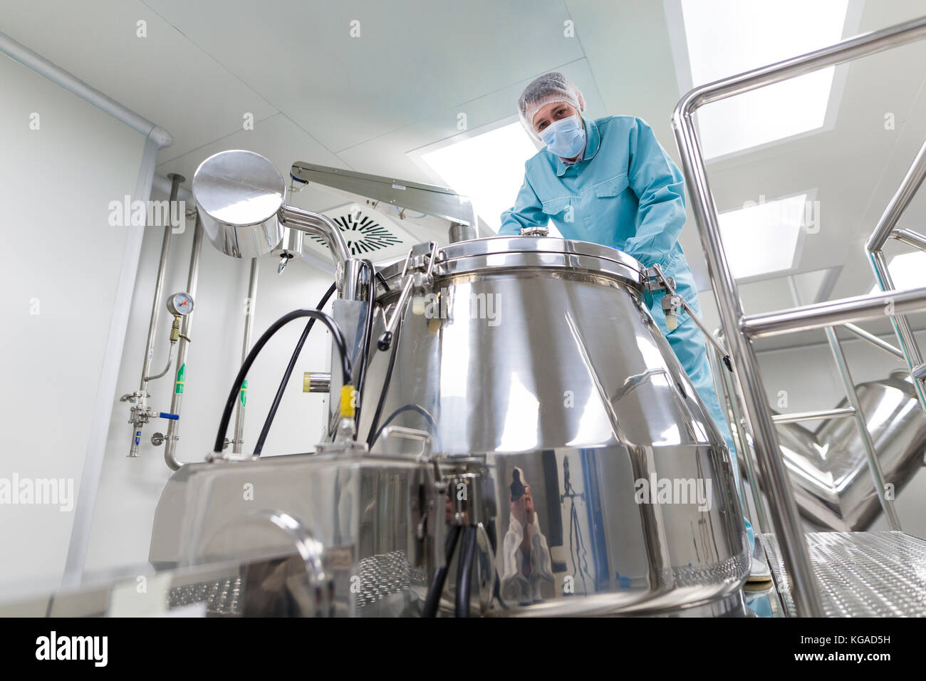 scientist look in steel tank in laboratory Stock Photo - Alamy