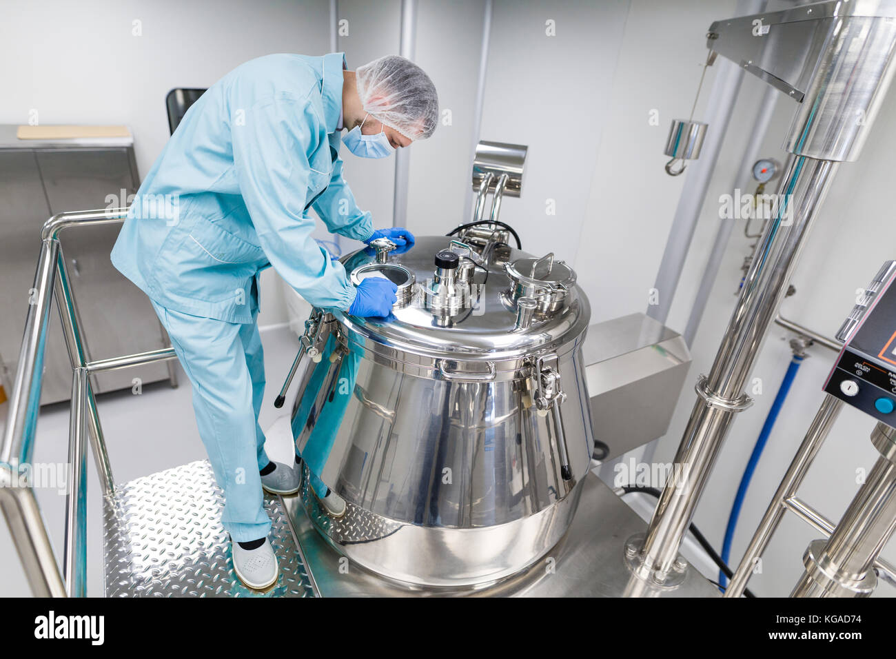 plant picture, scientist is looking inside the tank Stock Photo - Alamy