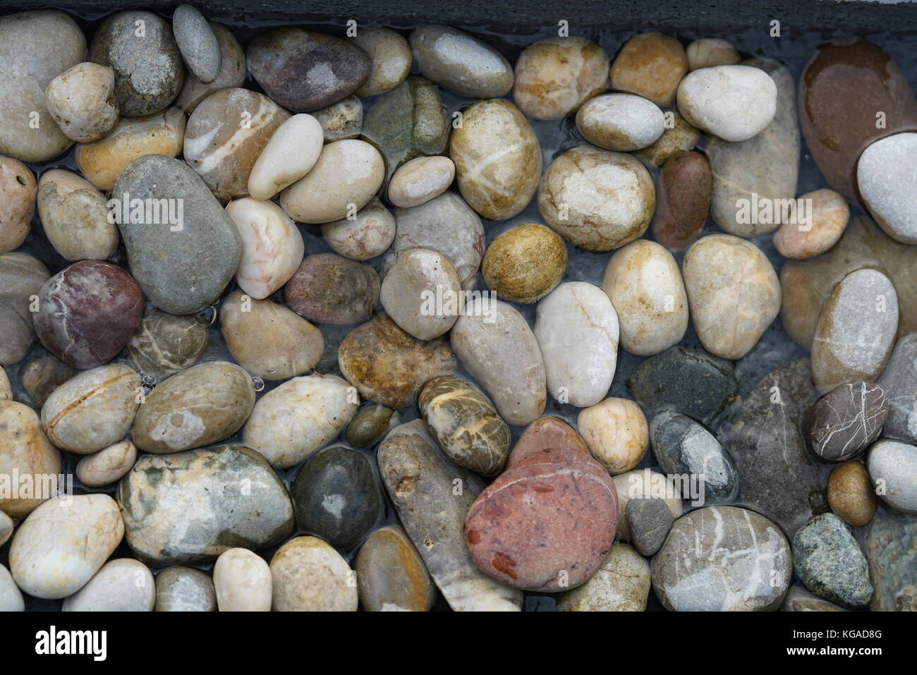 Stones under the surface of water Stock Photo - Alamy