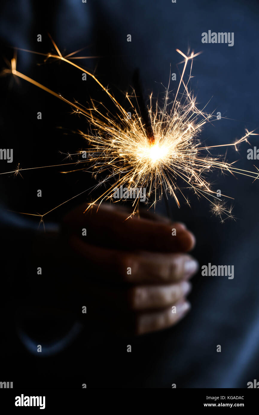 Hand held firework hi-res stock photography and images - Alamy