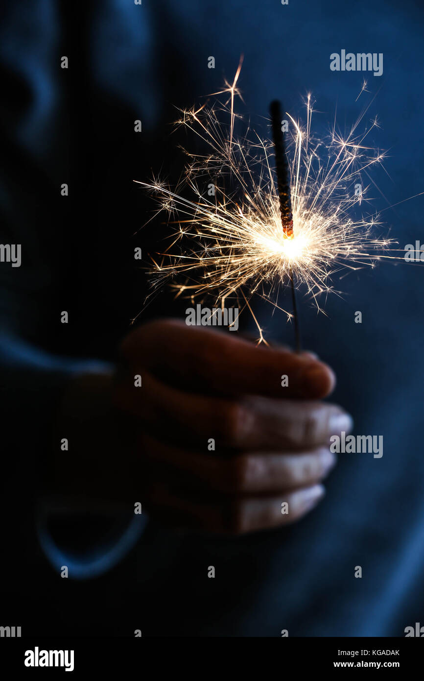 Hand held sparkler Stock Photo - Alamy