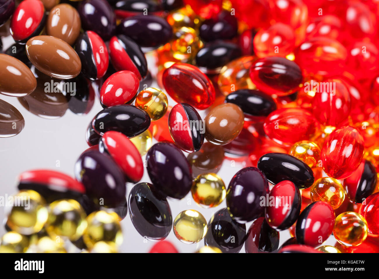 scattering the capsules and tablets Stock Photo - Alamy