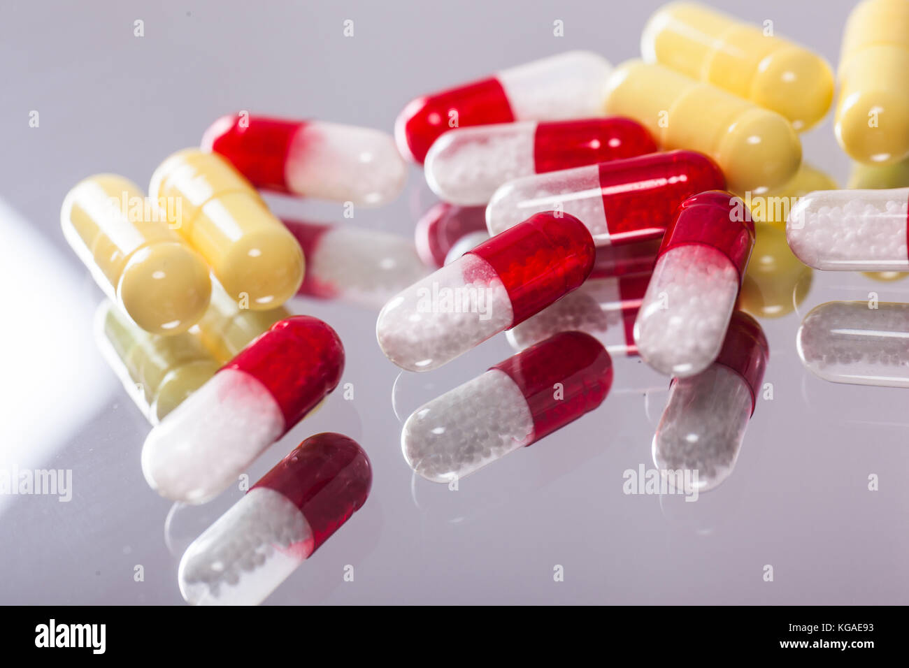 scattering the capsules and tablets Stock Photo - Alamy