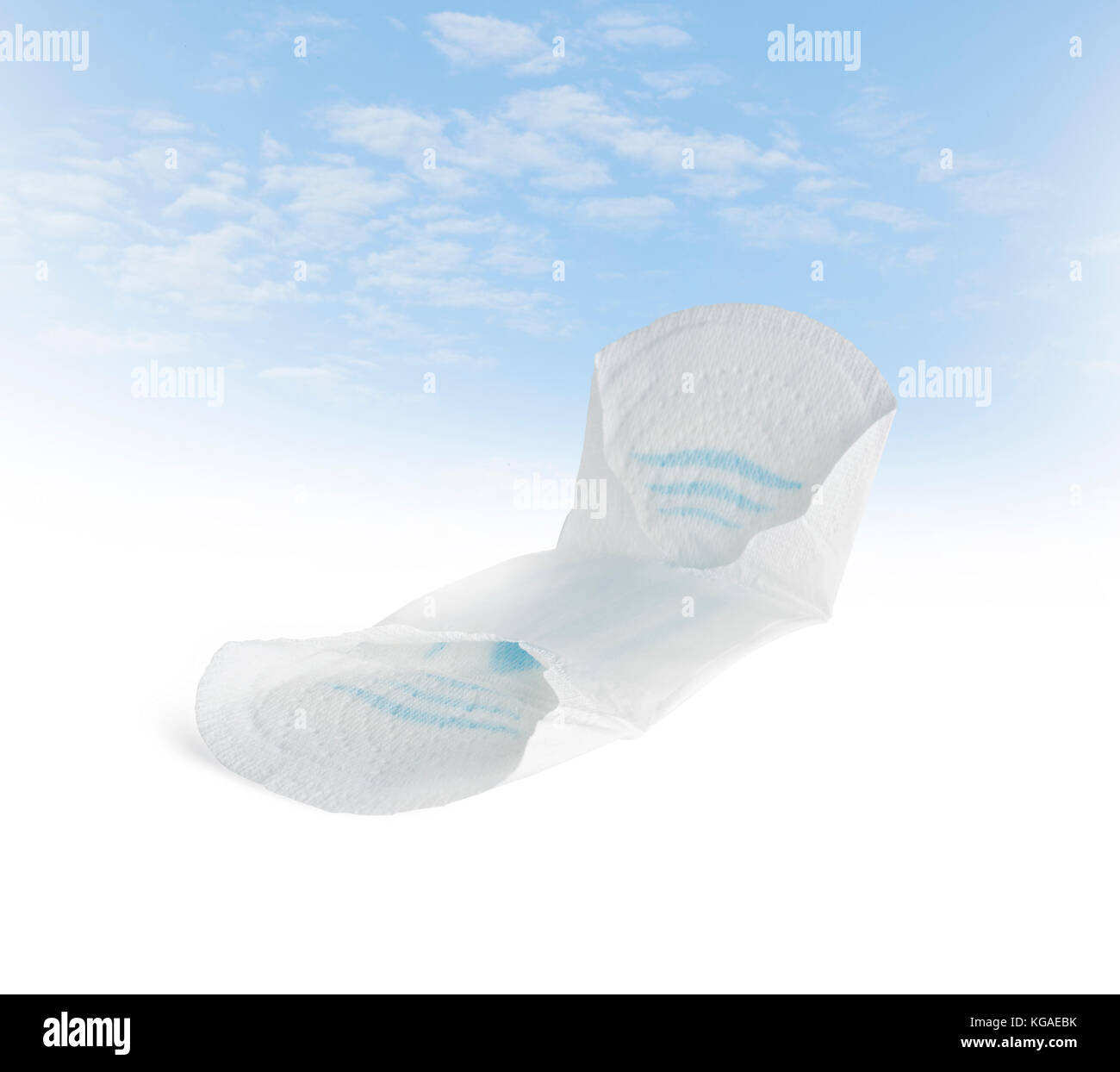 Female hygiene pad on a blue sky background. With clipping path Stock ...