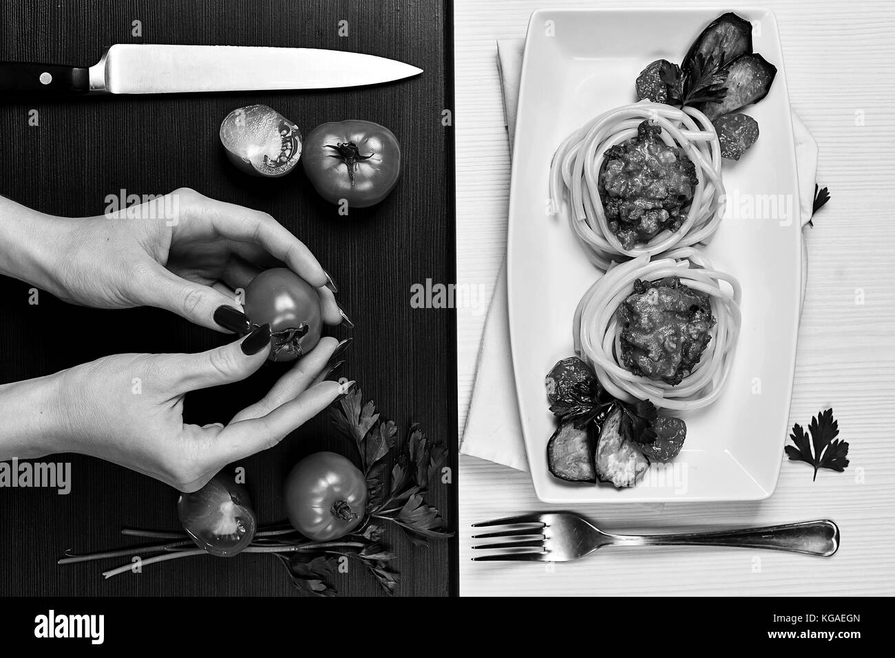 Dinner in the restaurant. Hands plates of food. Fork for eating Stock ...