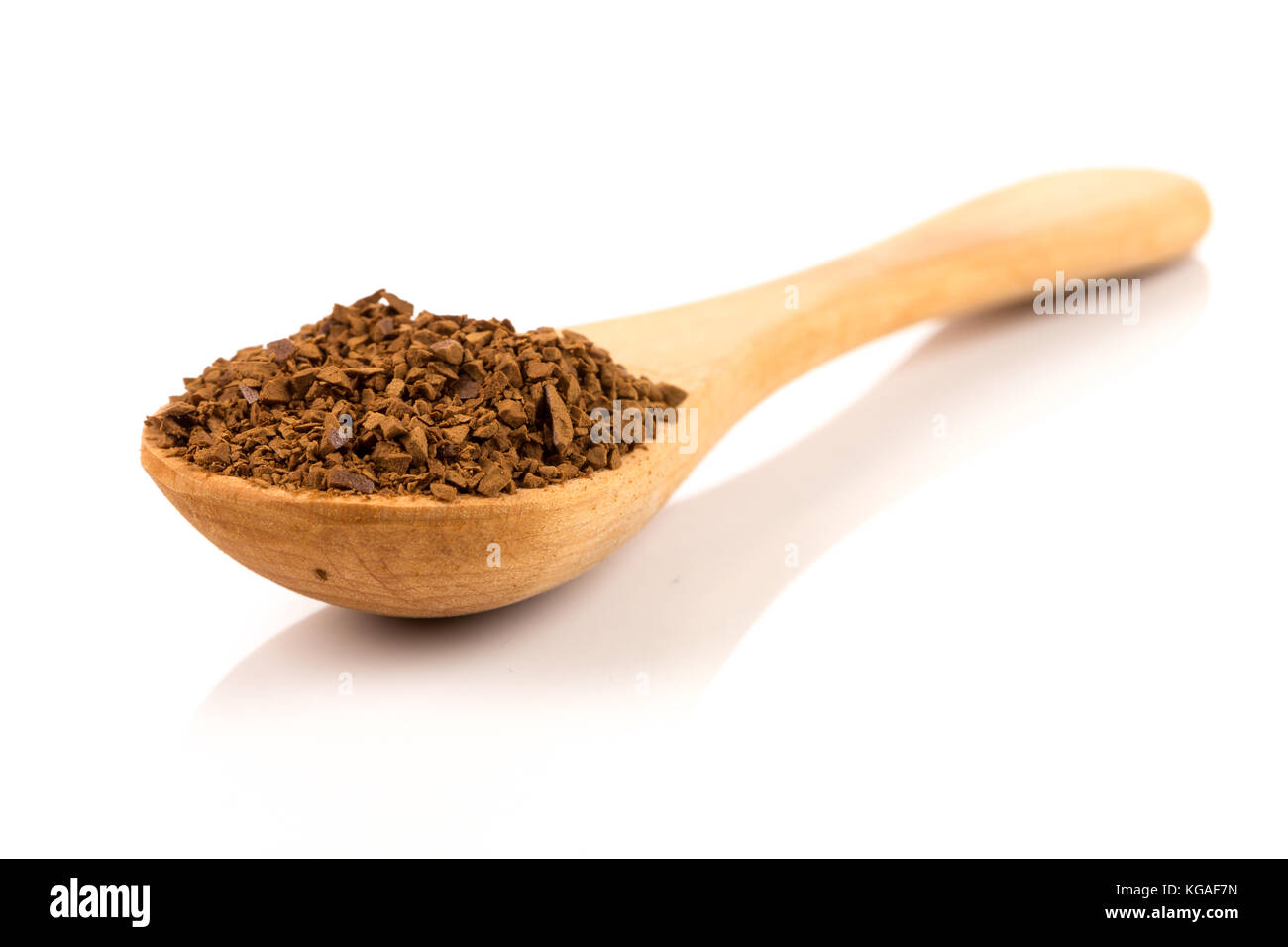 Heap of instant coffee in spoon isolated on white background Stock ...