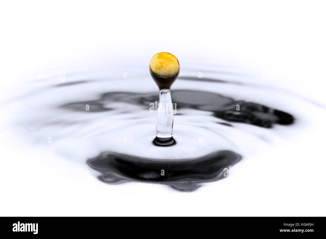 Colored water drop splash Stock Photo - Alamy