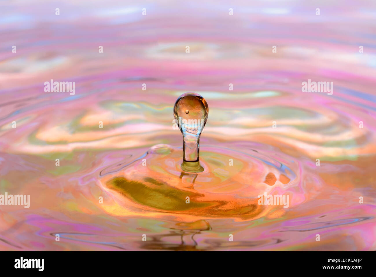 colored water drop splash Stock Photo - Alamy