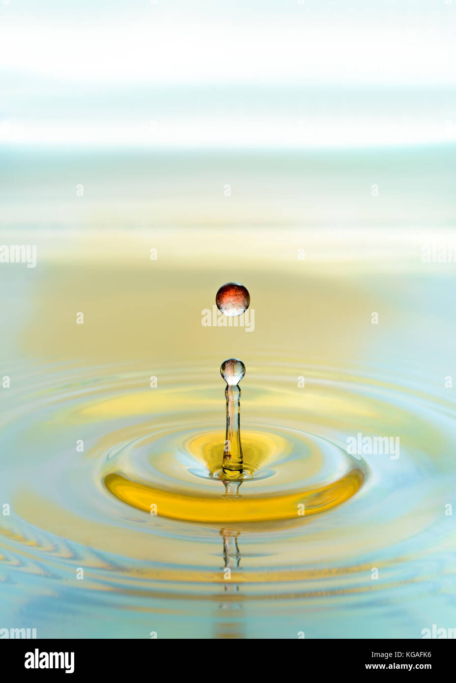 colored water drop splash Stock Photo - Alamy