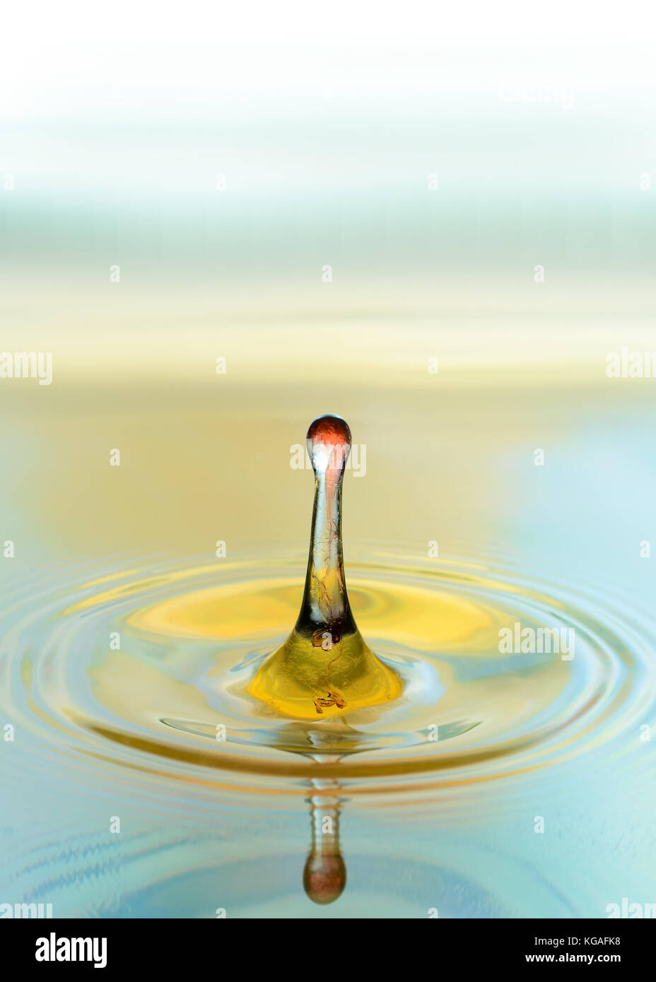 colored water drop splash Stock Photo - Alamy