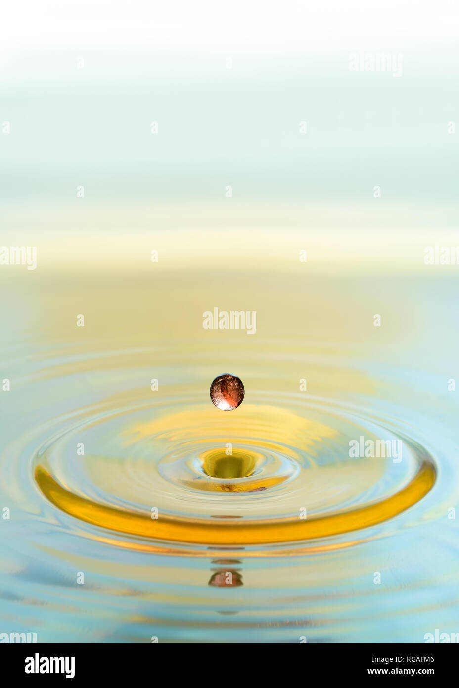 colored water drop splash Stock Photo - Alamy