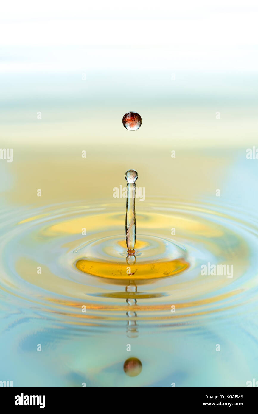 colored water drop splash Stock Photo - Alamy