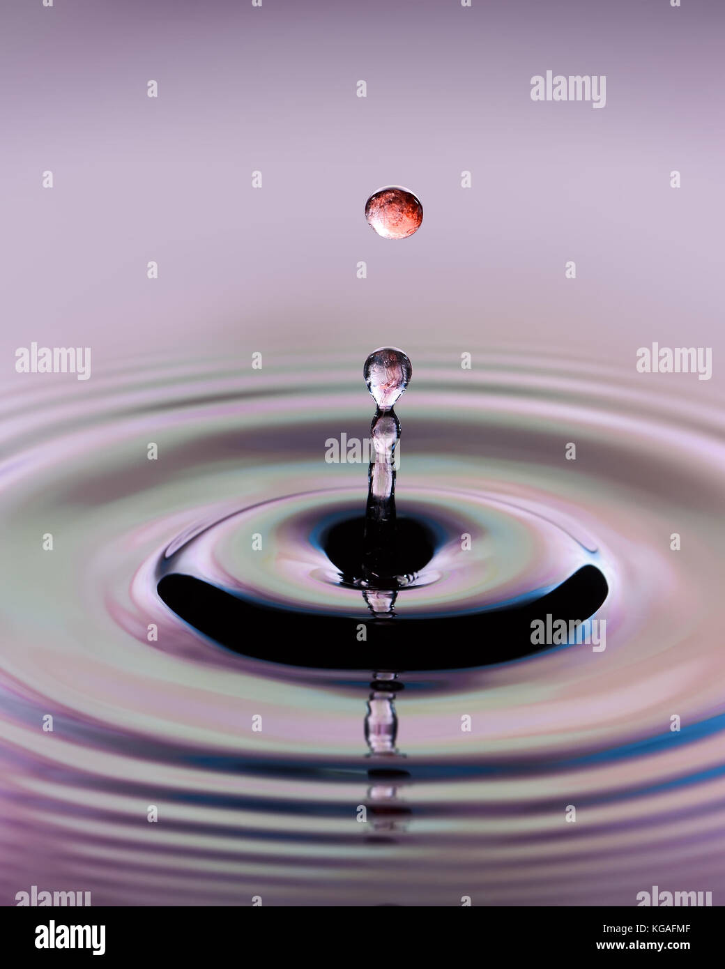 colored water drop splash Stock Photo - Alamy