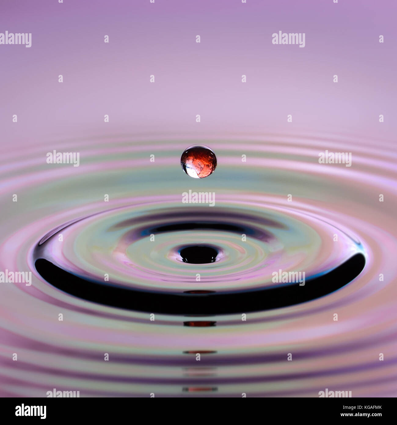 colored water drop splash Stock Photo - Alamy