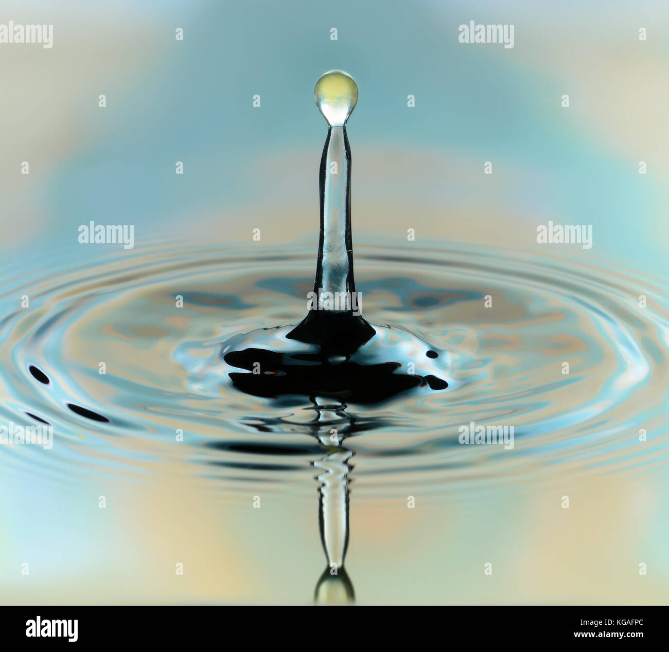 Colored water drop splash Stock Photo - Alamy