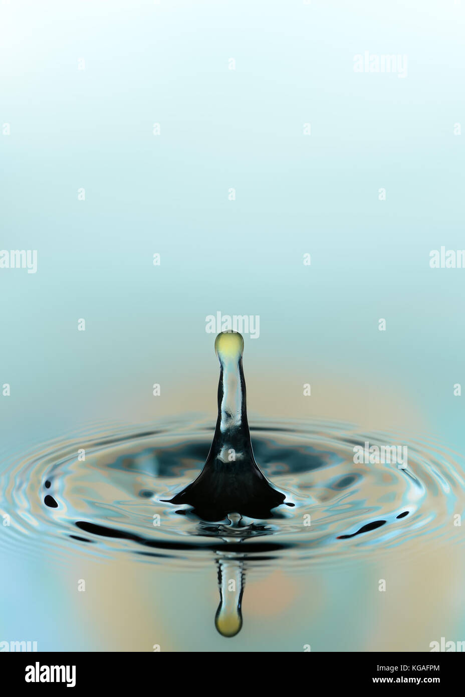 Colored water drop splash Stock Photo - Alamy