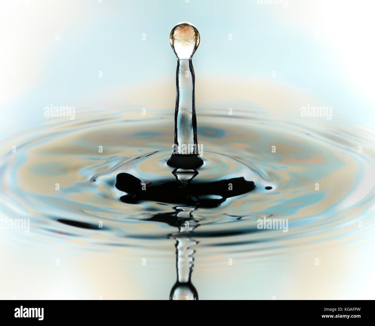 Colored water drop splash Stock Photo - Alamy