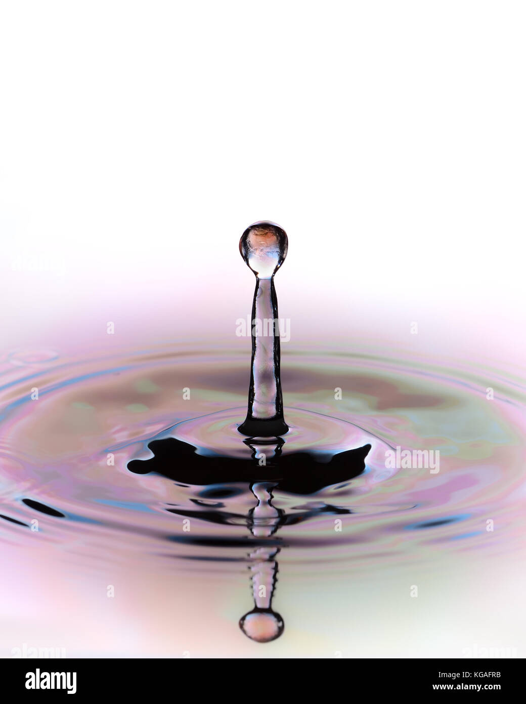 Colored water drop splash Stock Photo - Alamy