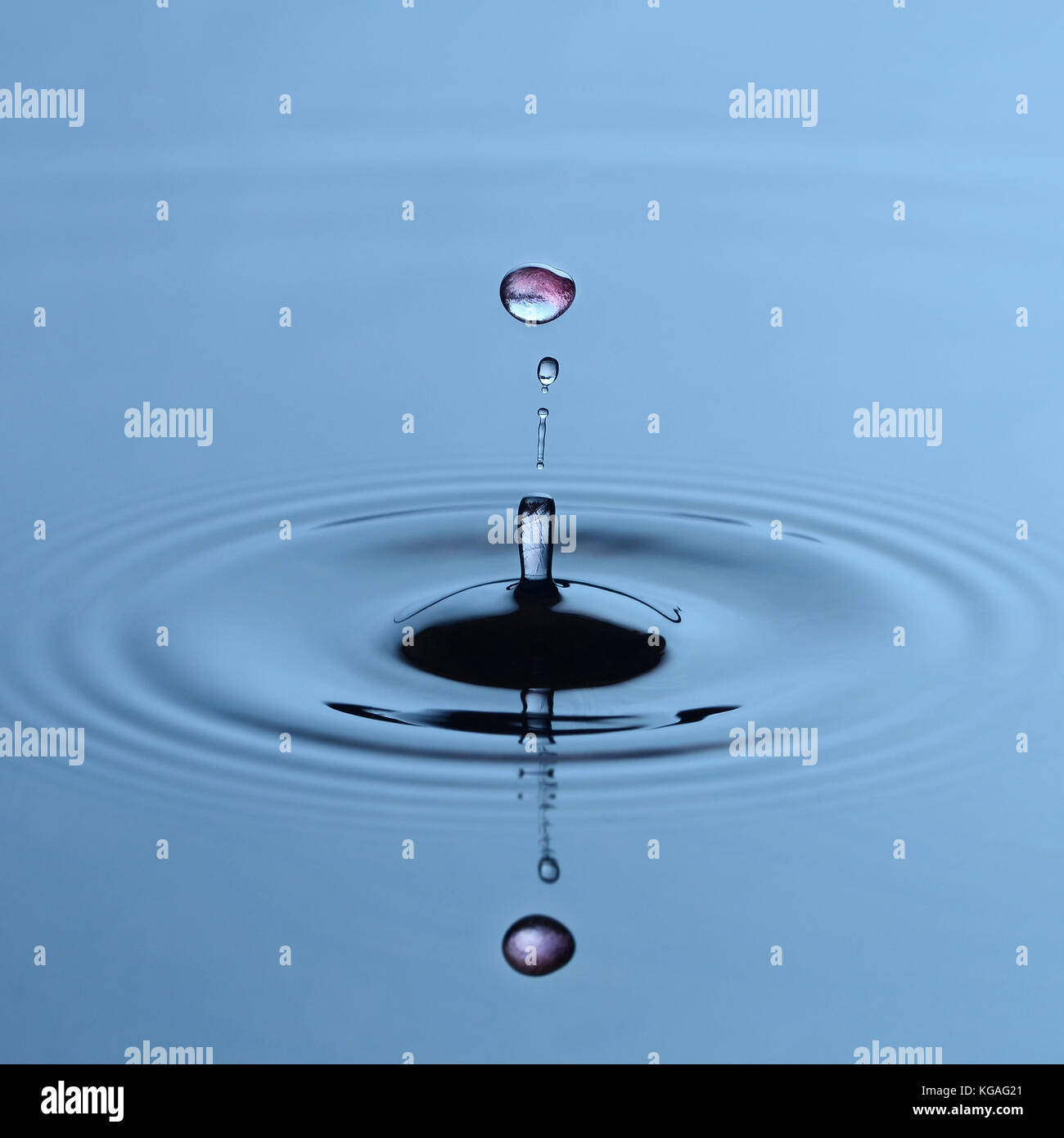 Colored water drop splash Stock Photo - Alamy