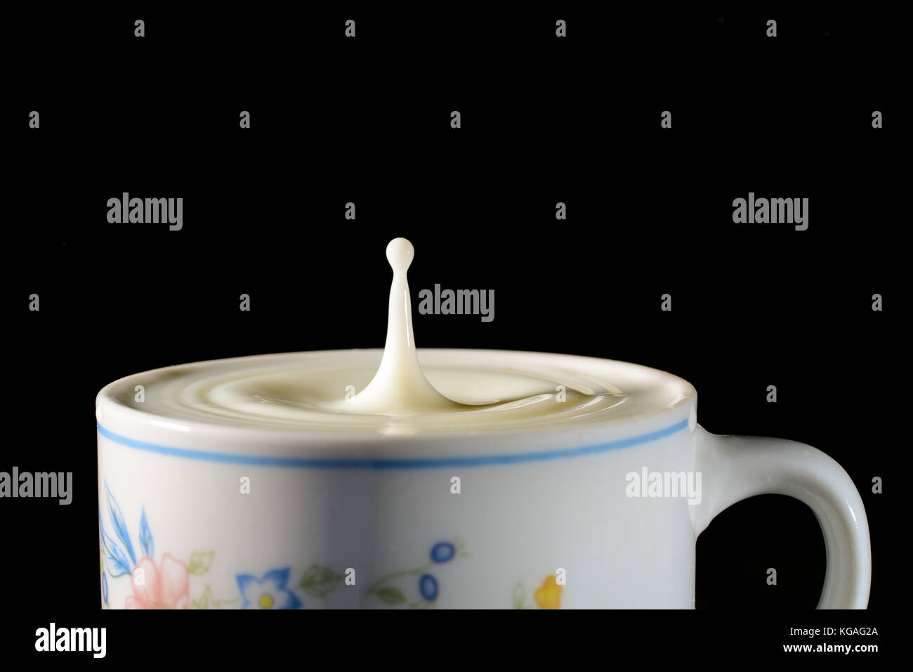 Milk drop splash Stock Photo - Alamy