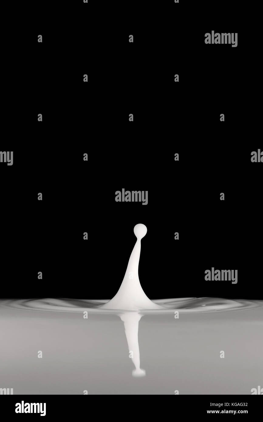Drop milk droplet falling hi-res stock photography and images - Alamy