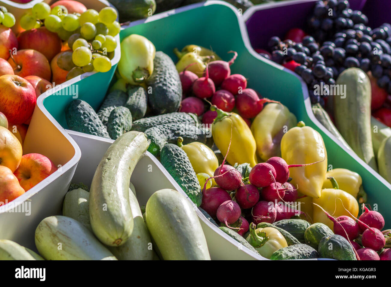 Farmers fruit market with various colorful fresh fruits and vegetables ...