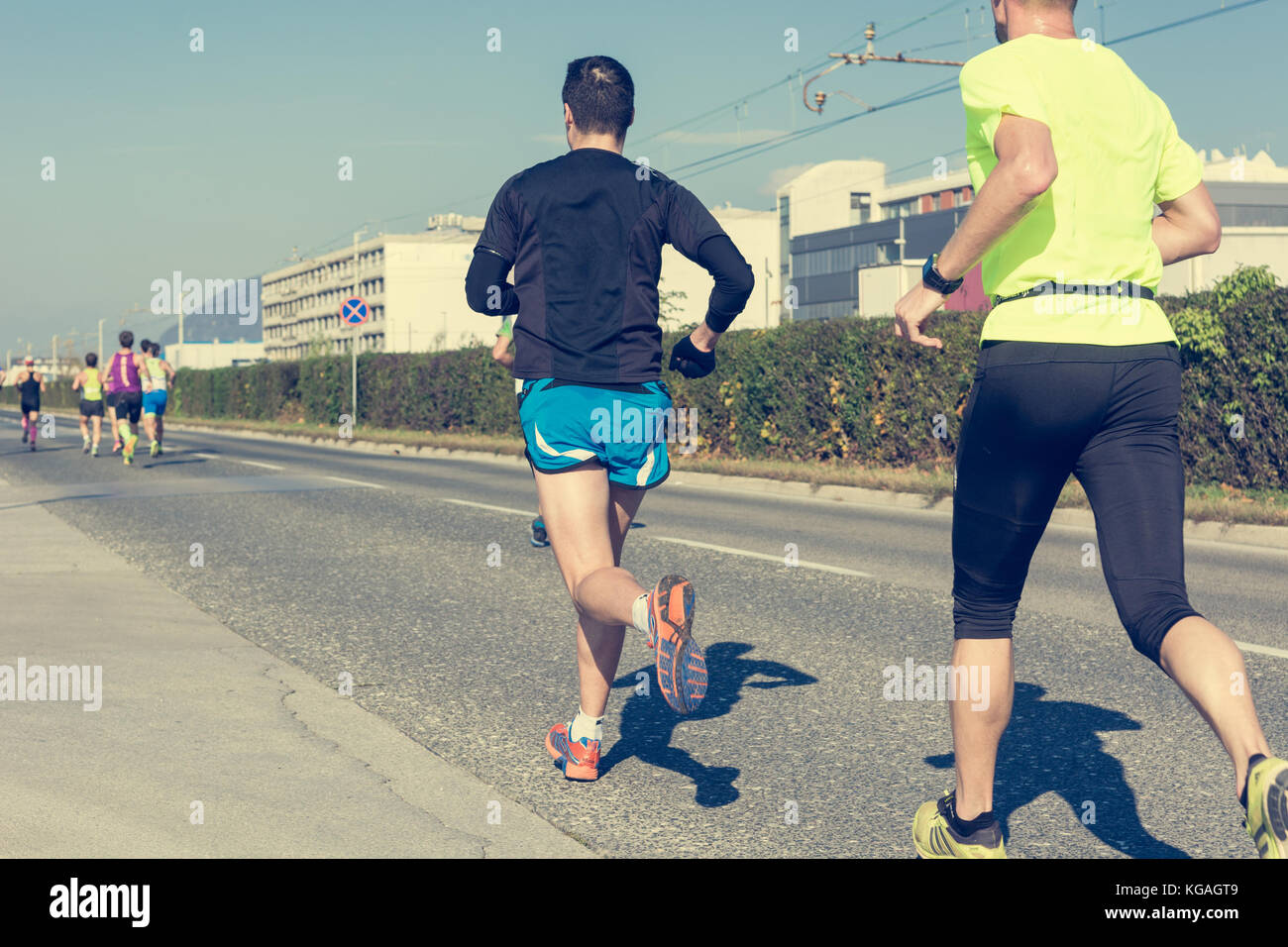 Pair of runners on marathon Stock Photo - Alamy
