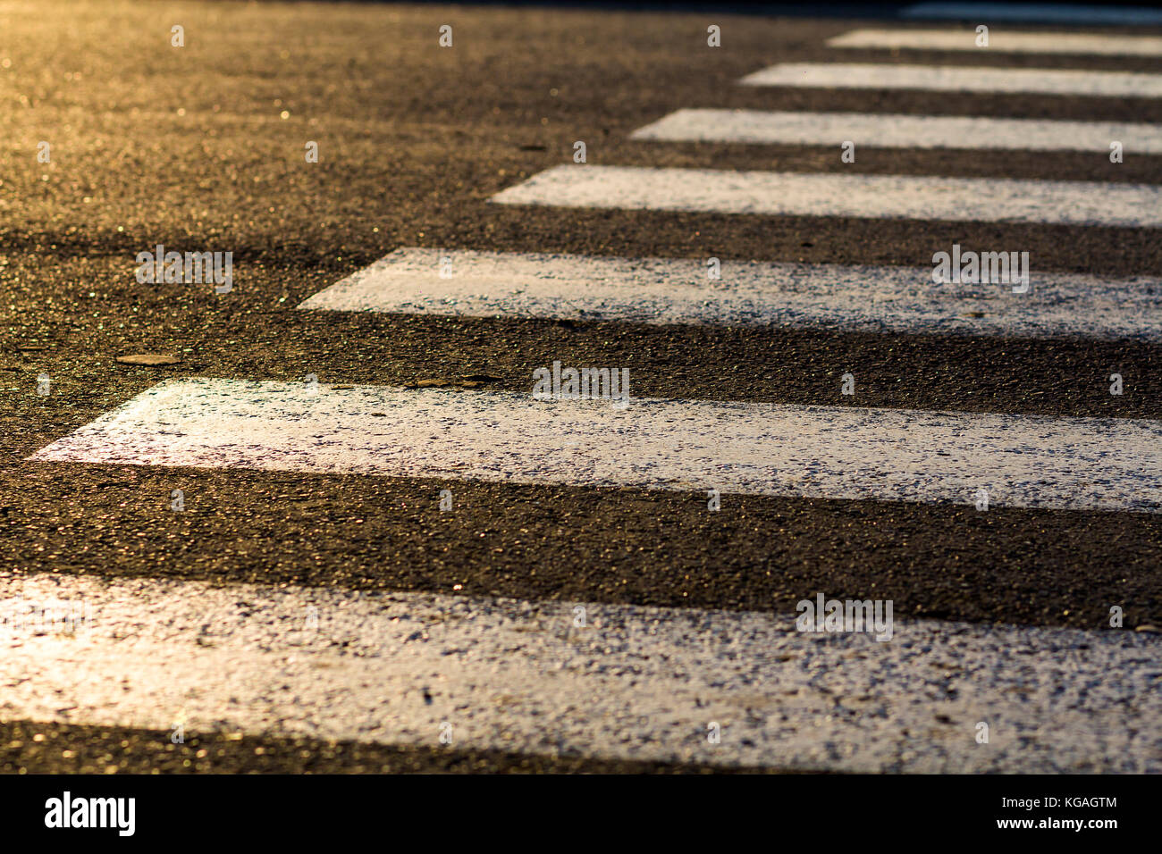 Detail of dangerous road crossing with pedestrian zebra. Safety concept ...