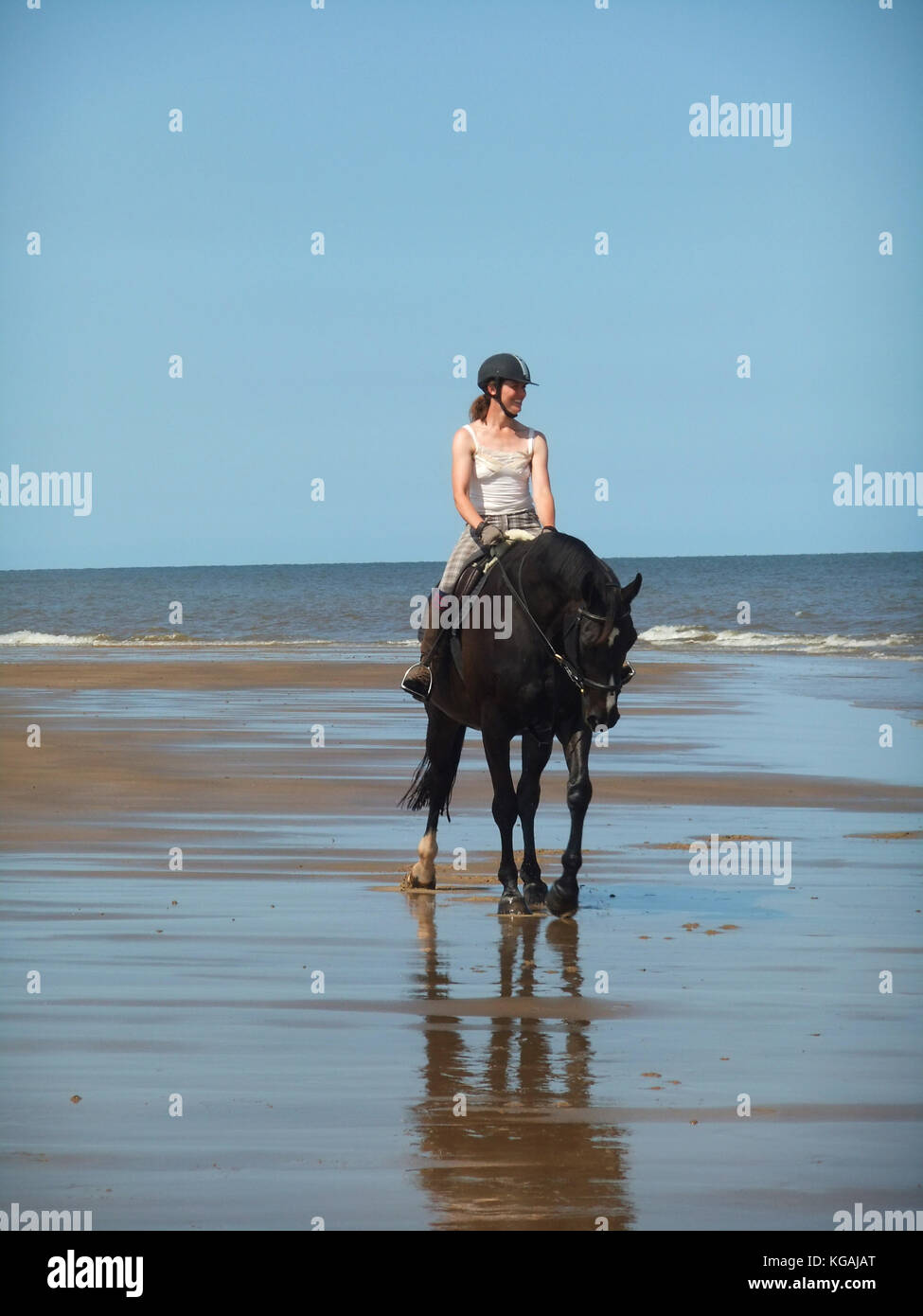 Woman riding horse sea hi-res stock photography and images - Alamy
