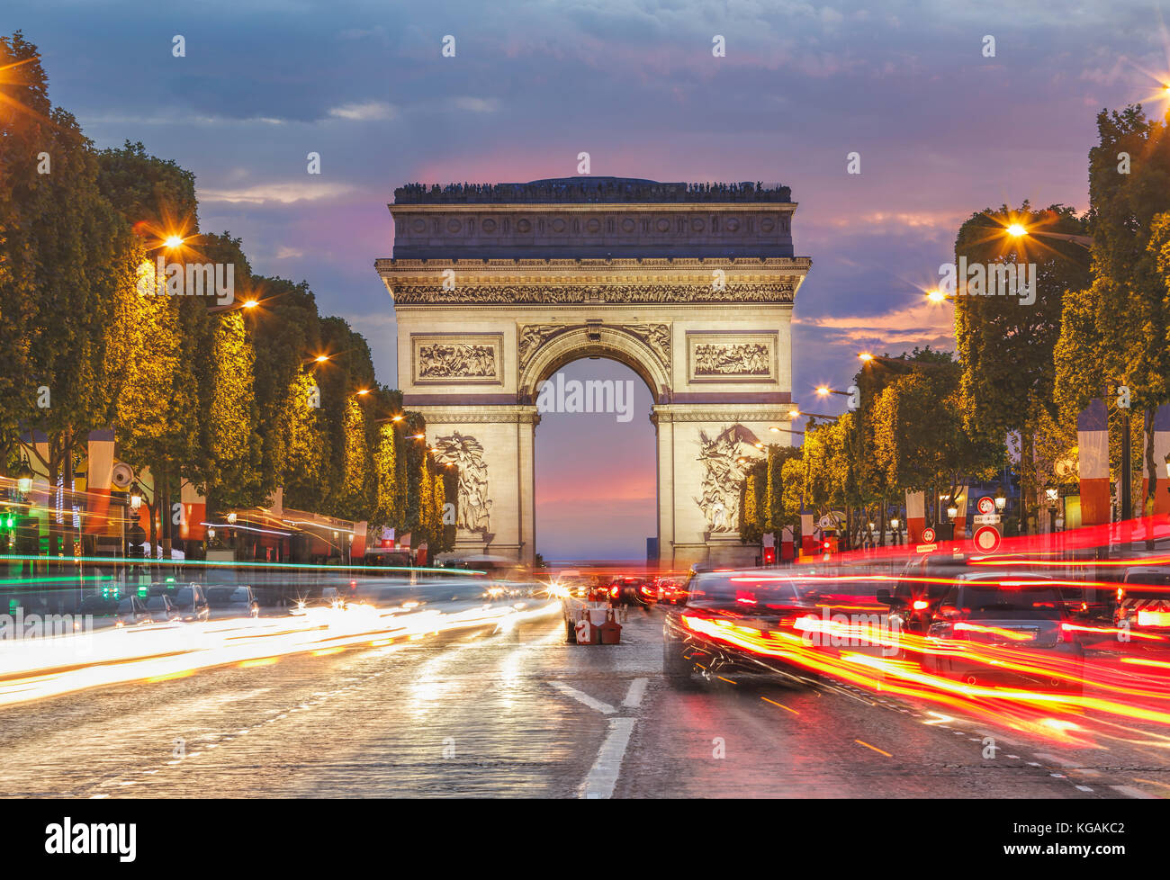 Scenic view of the Champs Elysees with the Triumphal Arch and traffic ...