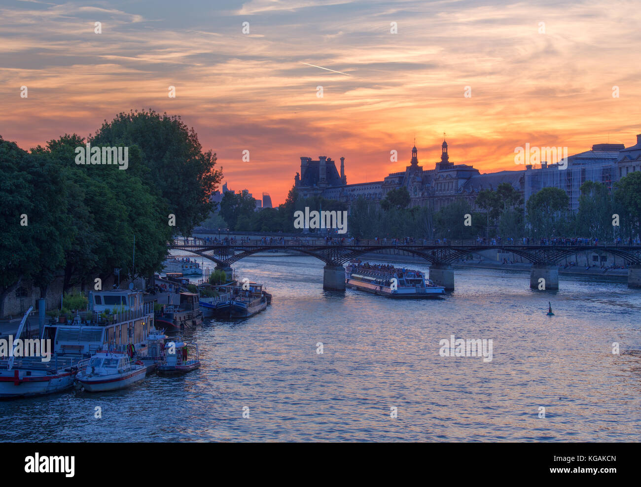 Dramatic sunset over river Seine in Paris, France, with Pont des Arts ...