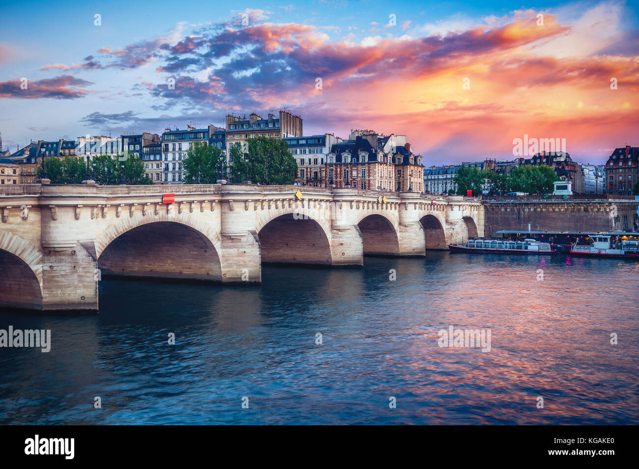 Famous Pont Neuf in Paris, France. Spectacular cityscape with dramatic ...