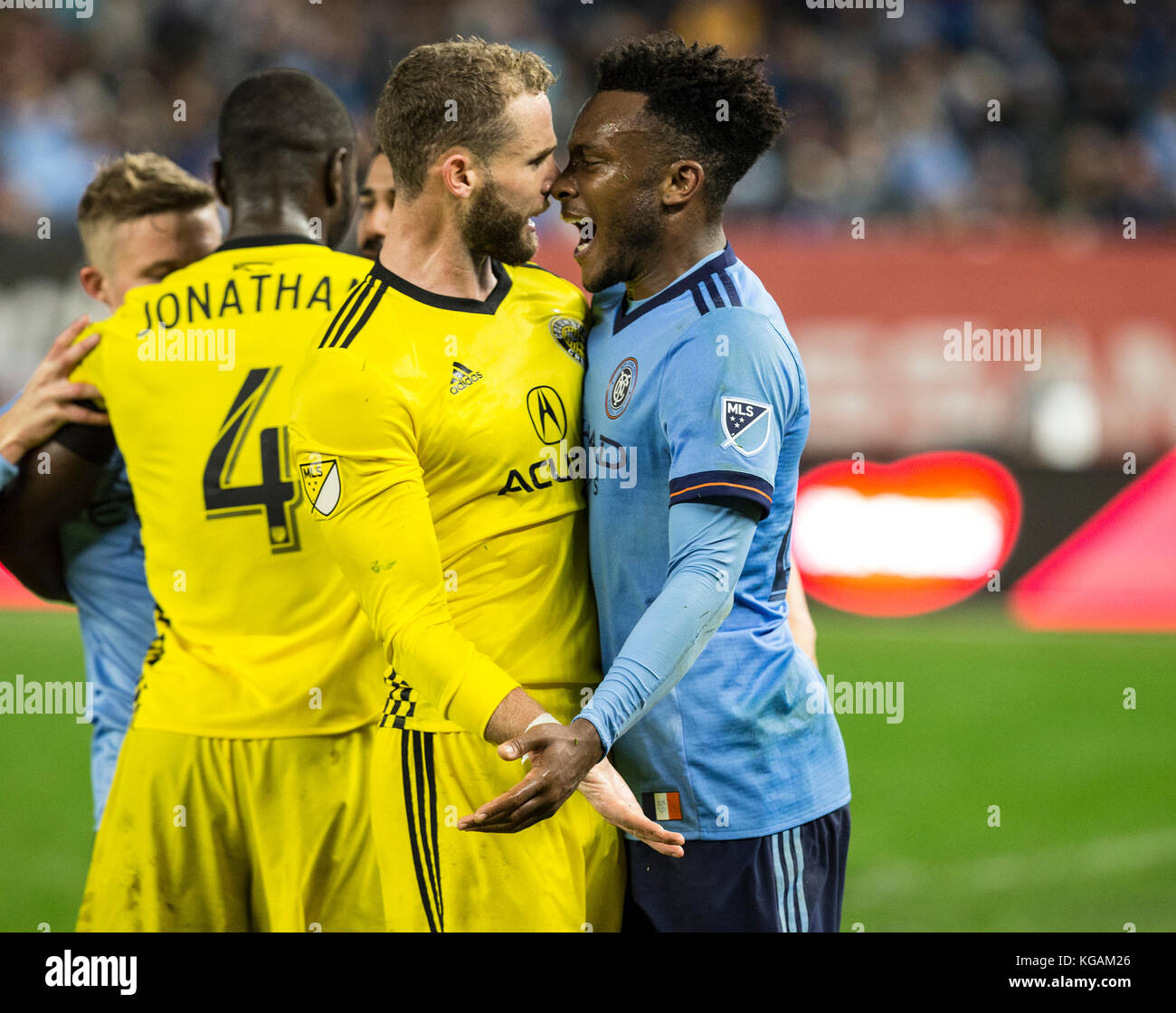 Josh Williams (3) of Columbus Crew confronts Rodney Wallace (23) of NYC ...
