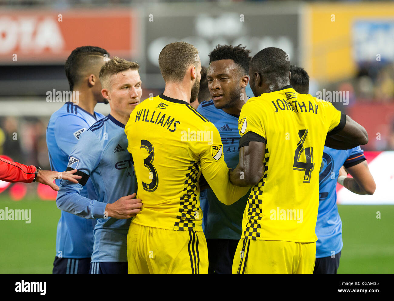 Josh Williams (3) of Columbus Crew confronts Rodney Wallace (23) of NYC ...