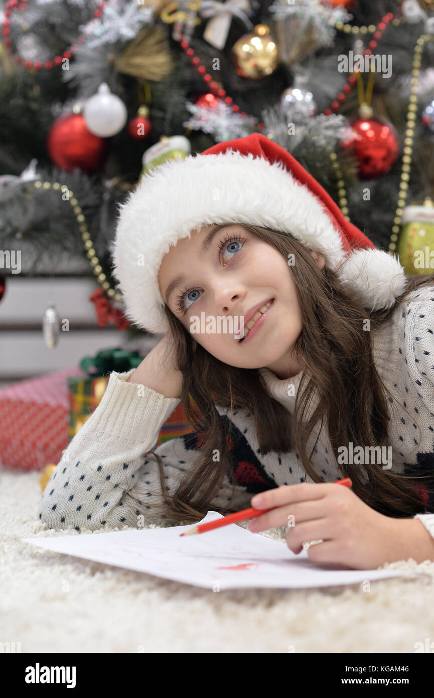 Girl writing letter Stock Photo - Alamy