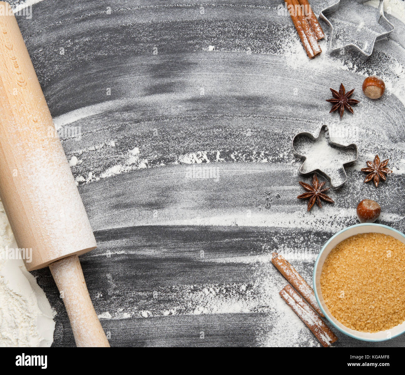 Ingredients for christmas baking - flour, spices and cookie cutters ...