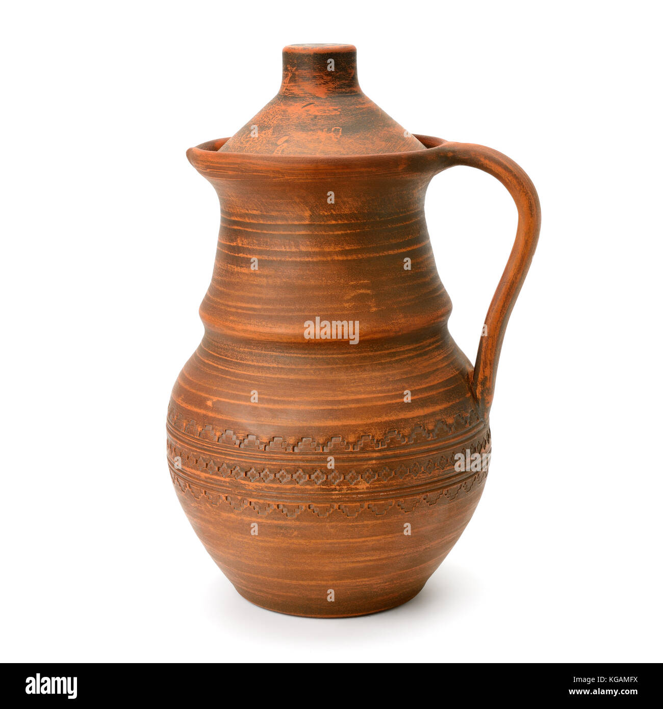 clay jug with a lid isolated on a white background Stock Photo - Alamy