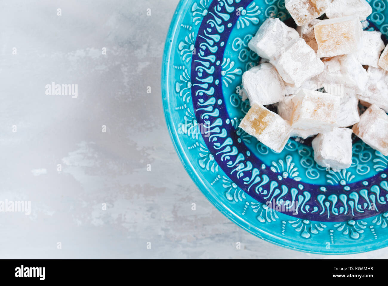 Traditional Turkish Rahat Delight in a blue bowl Stock Photo - Alamy