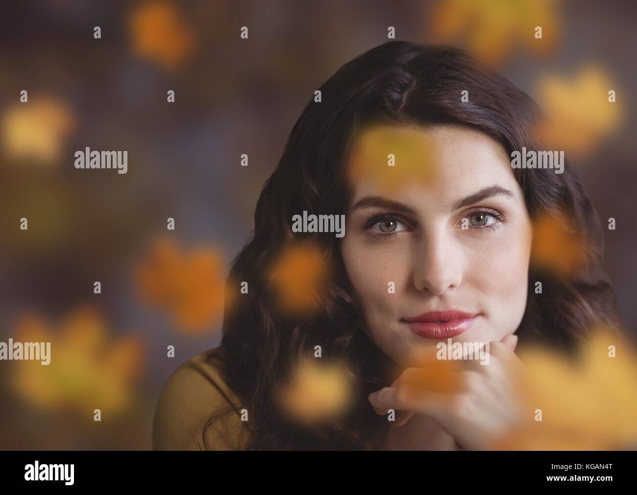 Digital composite of Woman's face in forest with leaves Stock Photo - Alamy