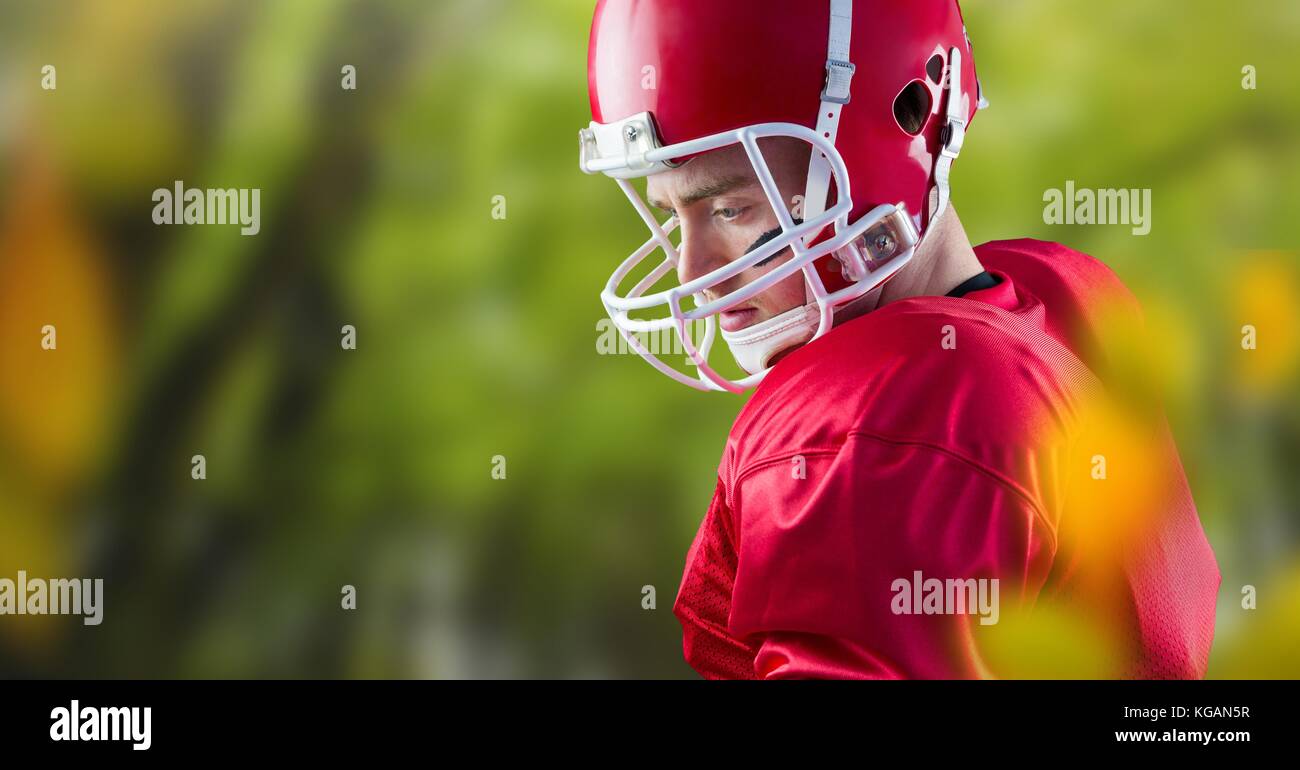 Digital composite of American football player full back in forest with ...