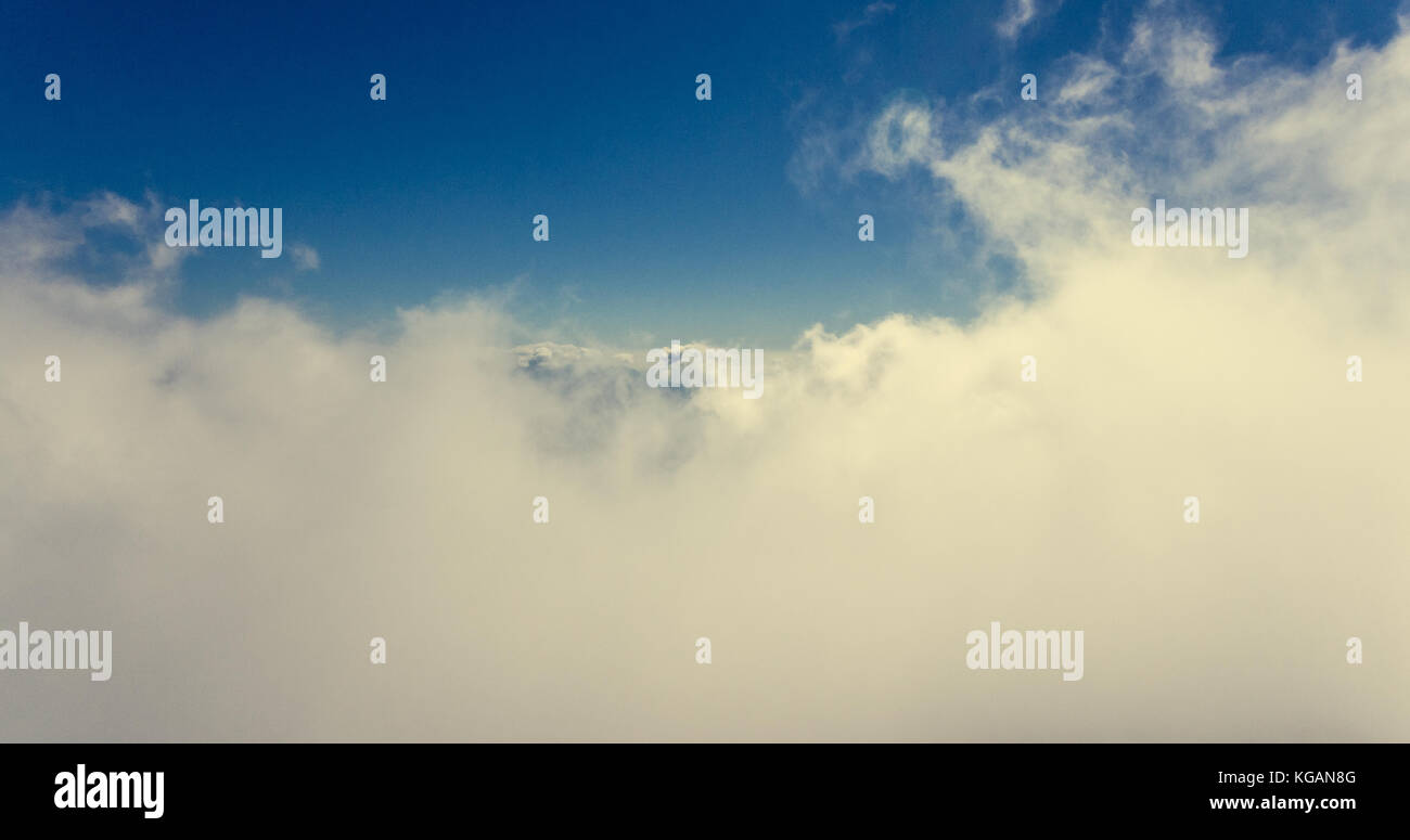 Aerial flying above clouds Stock Photo - Alamy