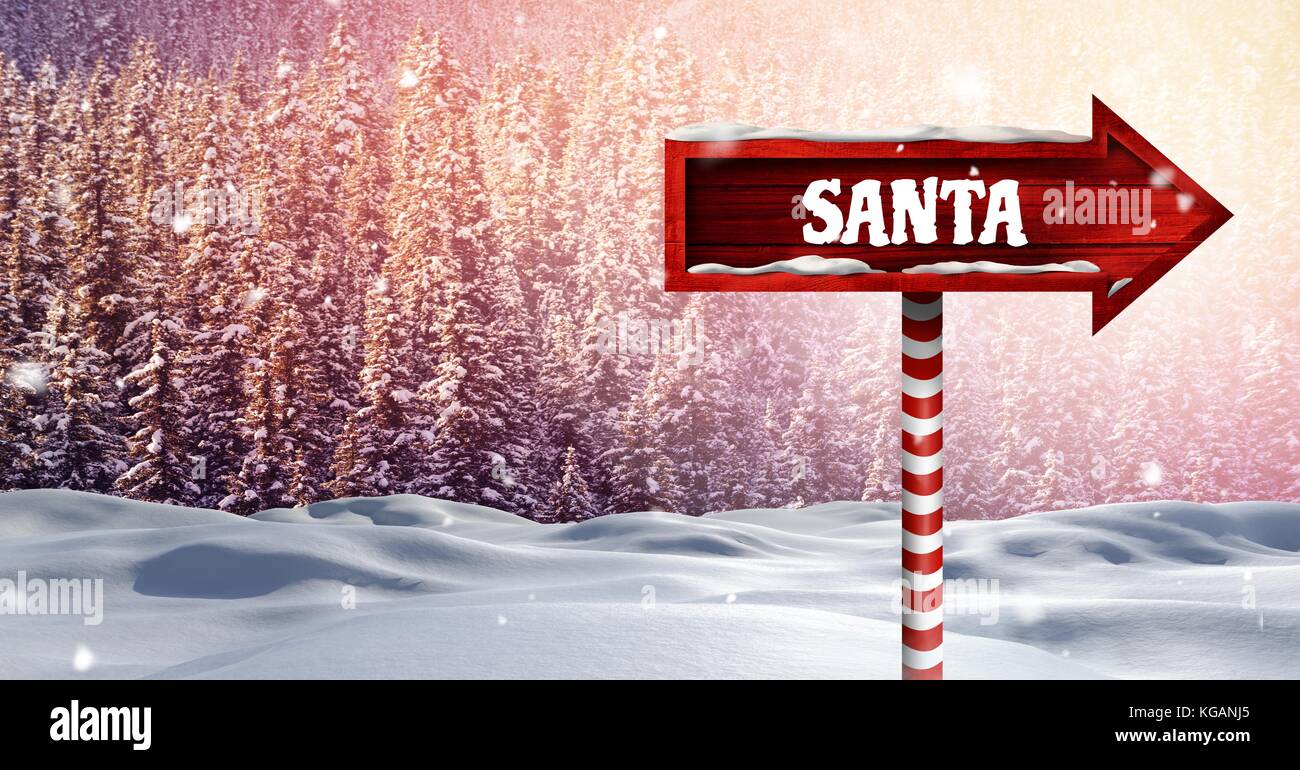 Digital composite of Santa text on Wooden signpost in Christmas Winter ...
