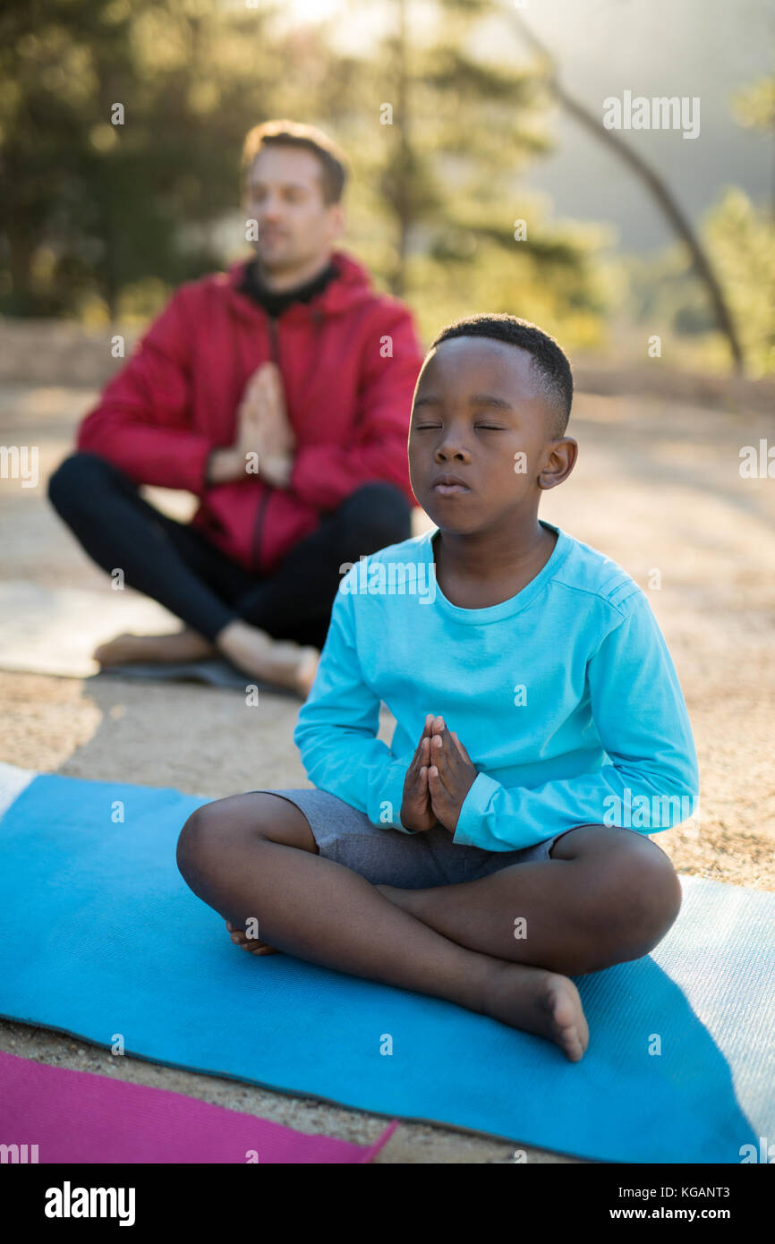 Kid Meditating High Resolution Stock Photography and Images - Alamy