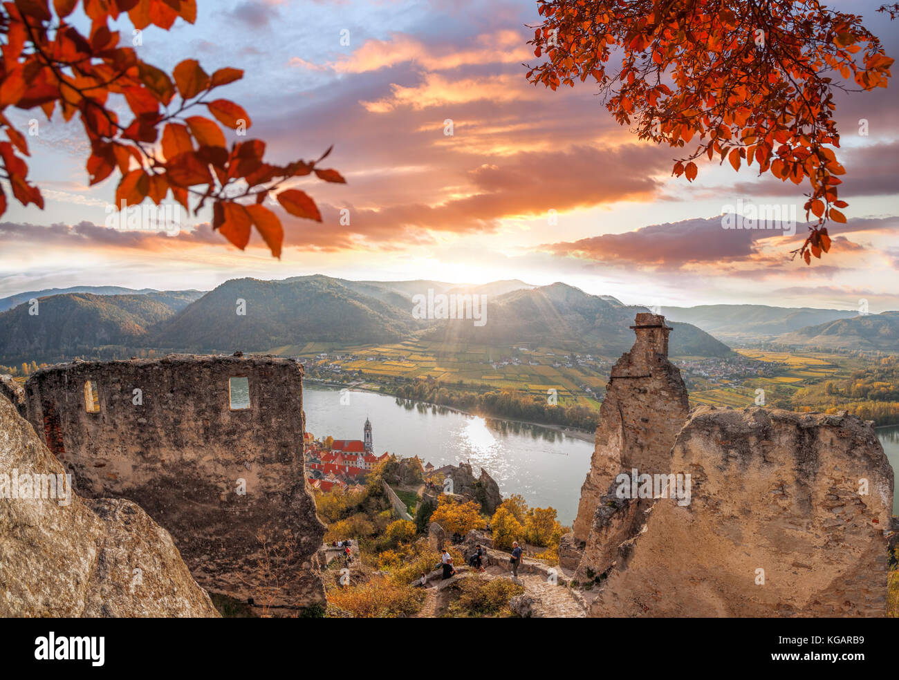 DUERNSTEIN CASTLE AND VILLAGE WITH DANUBE RIVER DURING AUTUMN IN ...