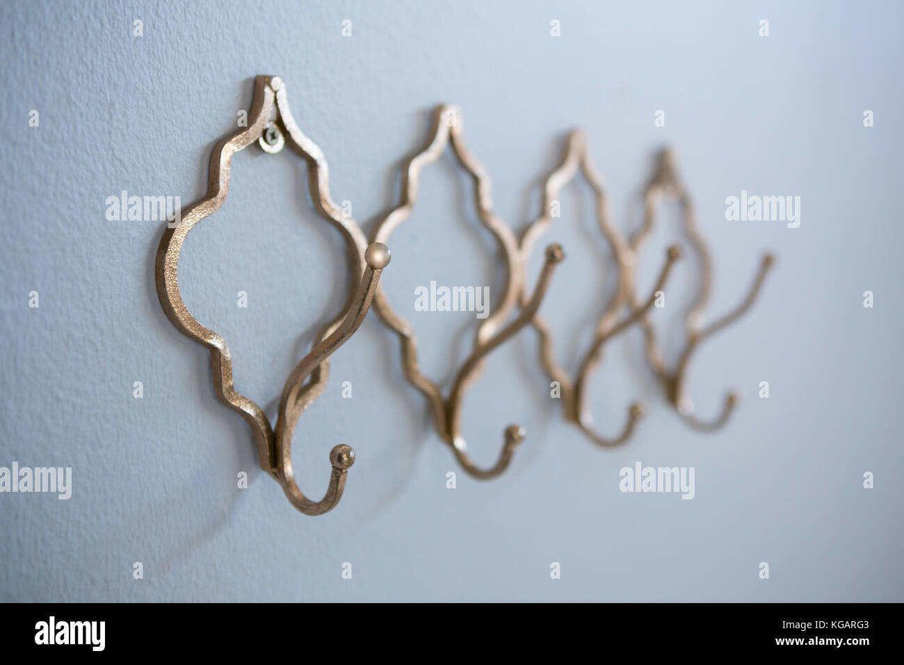 Close-up of hook attached on wall Stock Photo - Alamy