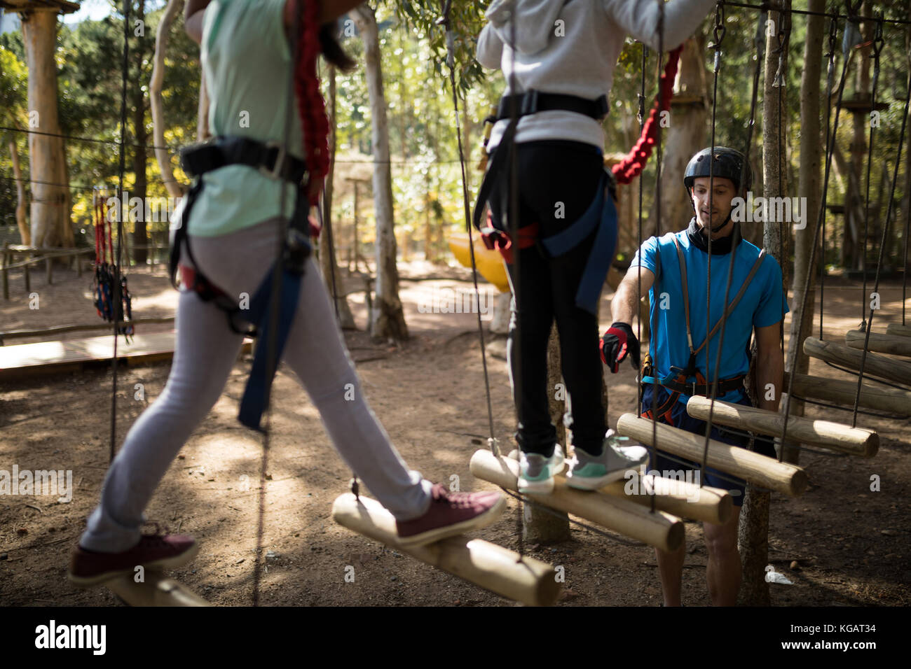 Child crossing rope bridge hi-res stock photography and images - Alamy